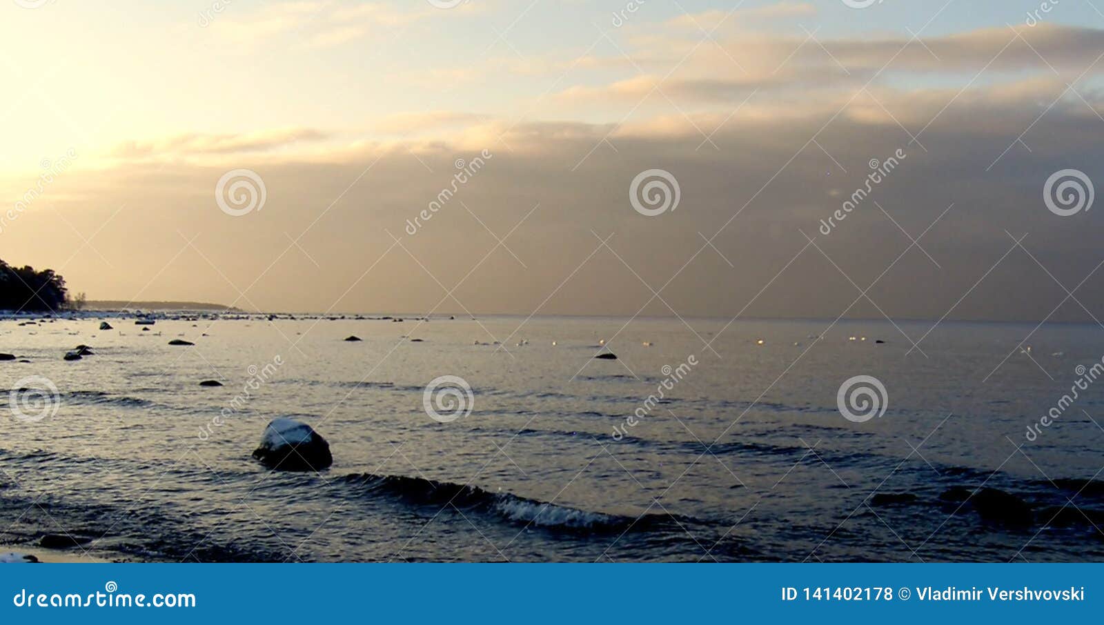 Lazy Waves Rolling on the Seashore Stock Photo - Image of coast, stones ...