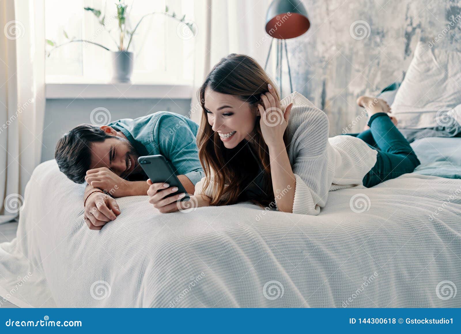 Lazy weekend. stock photo. Image of communication, love - 144300618