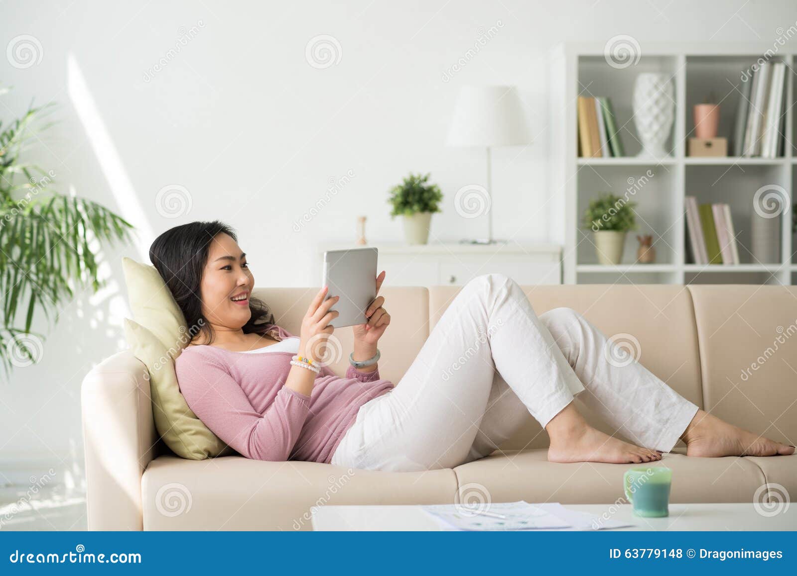 Lazy weekend stock photo. Image of home, technology, female - 63779148