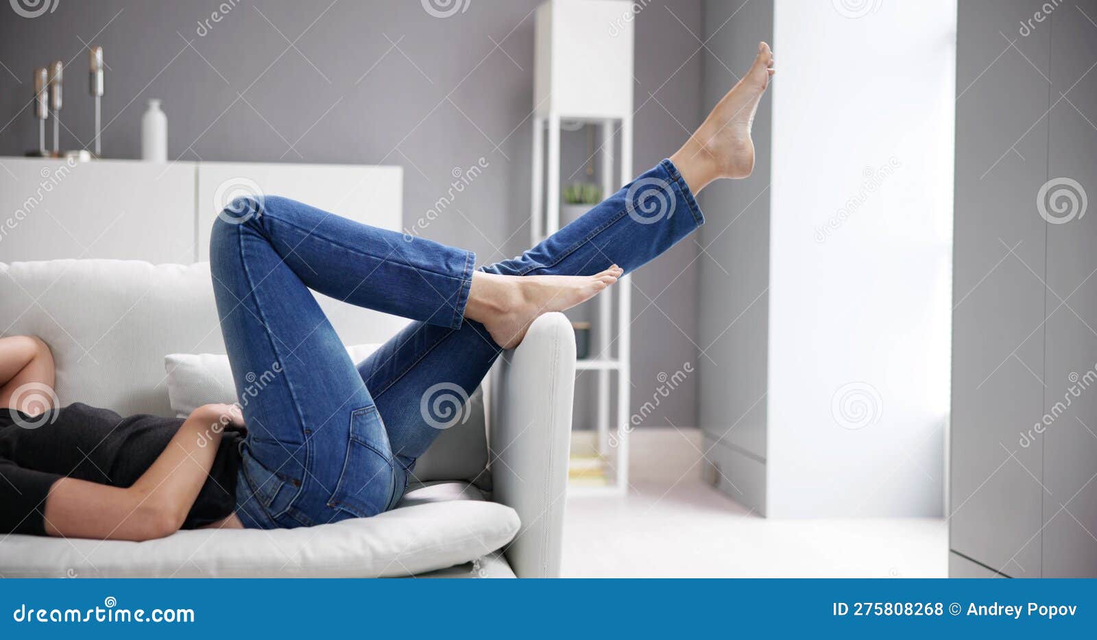 Lazy Woman Sitting Stretched Out In An Armchair With Popcorn And A ...