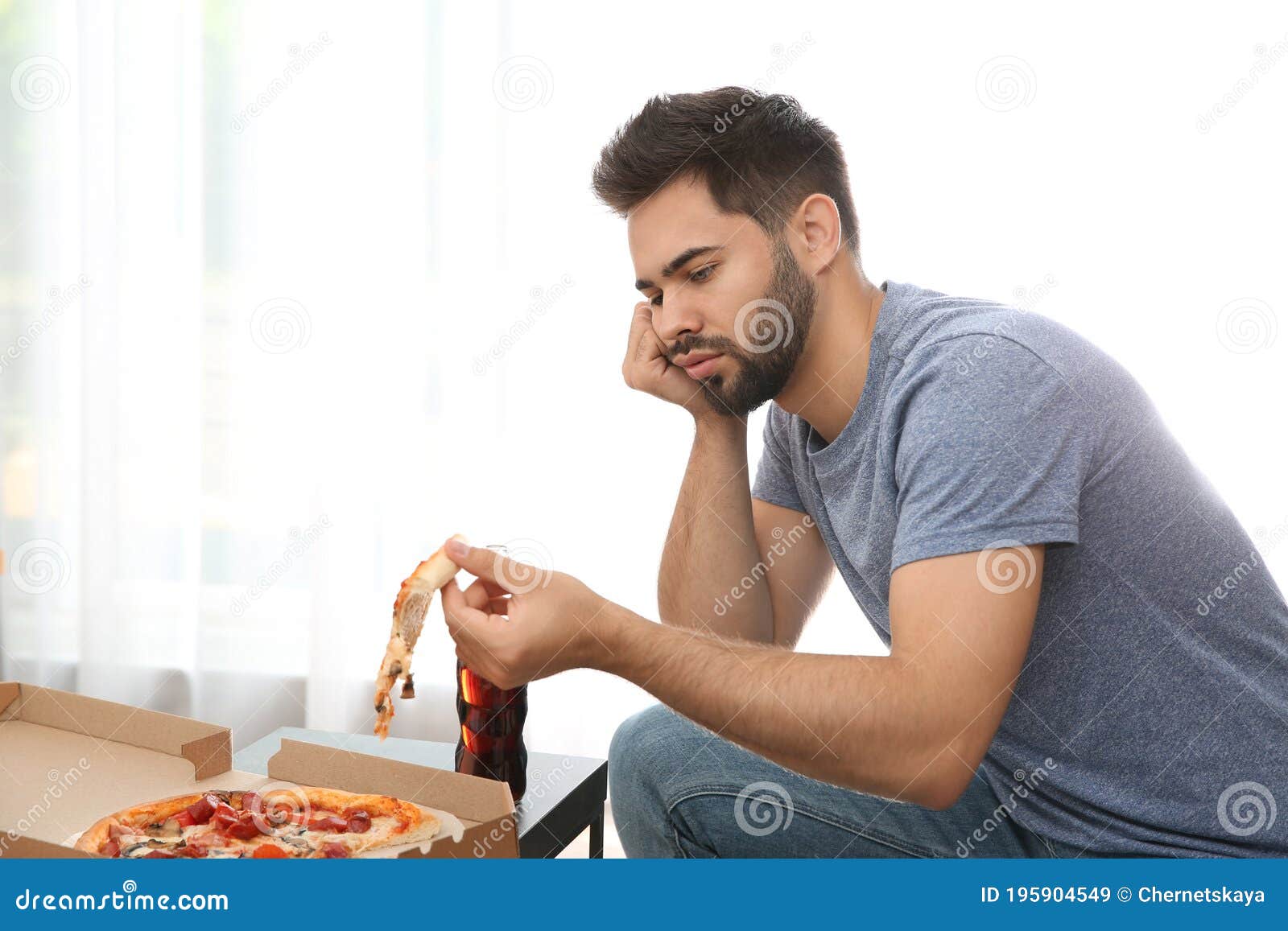 Lazy Young Man Eating Pizza at Home Stock Image - Image of drink, adult ...