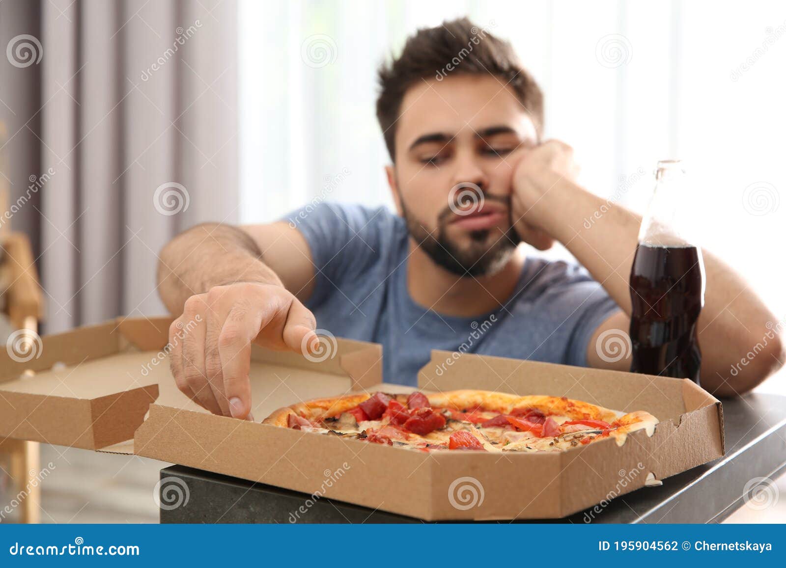 Lazy Young Man with Pizza and Drink at Home Stock Photo - Image of ...