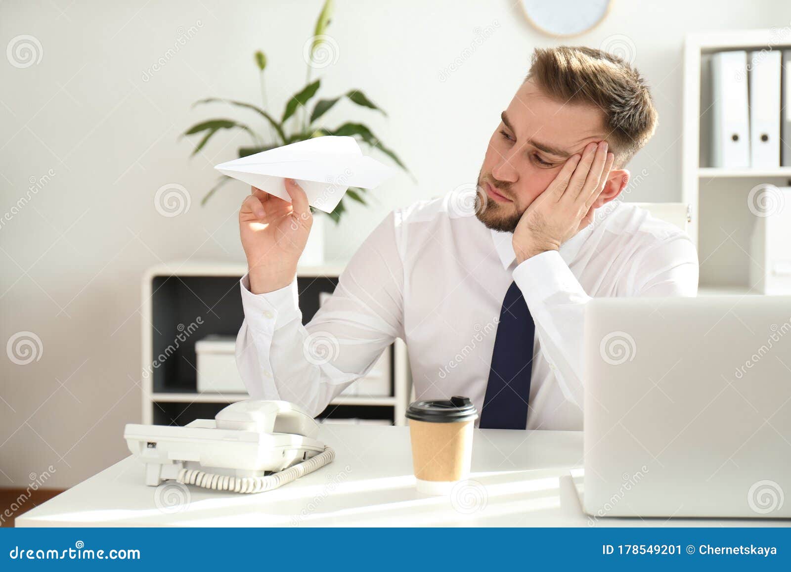 Lazy Man Playing with Paper Plane at Workplace Stock Image - Image of ... Lazy Man Playing with Paper Plane at Workplace Stock Image - Image of ...