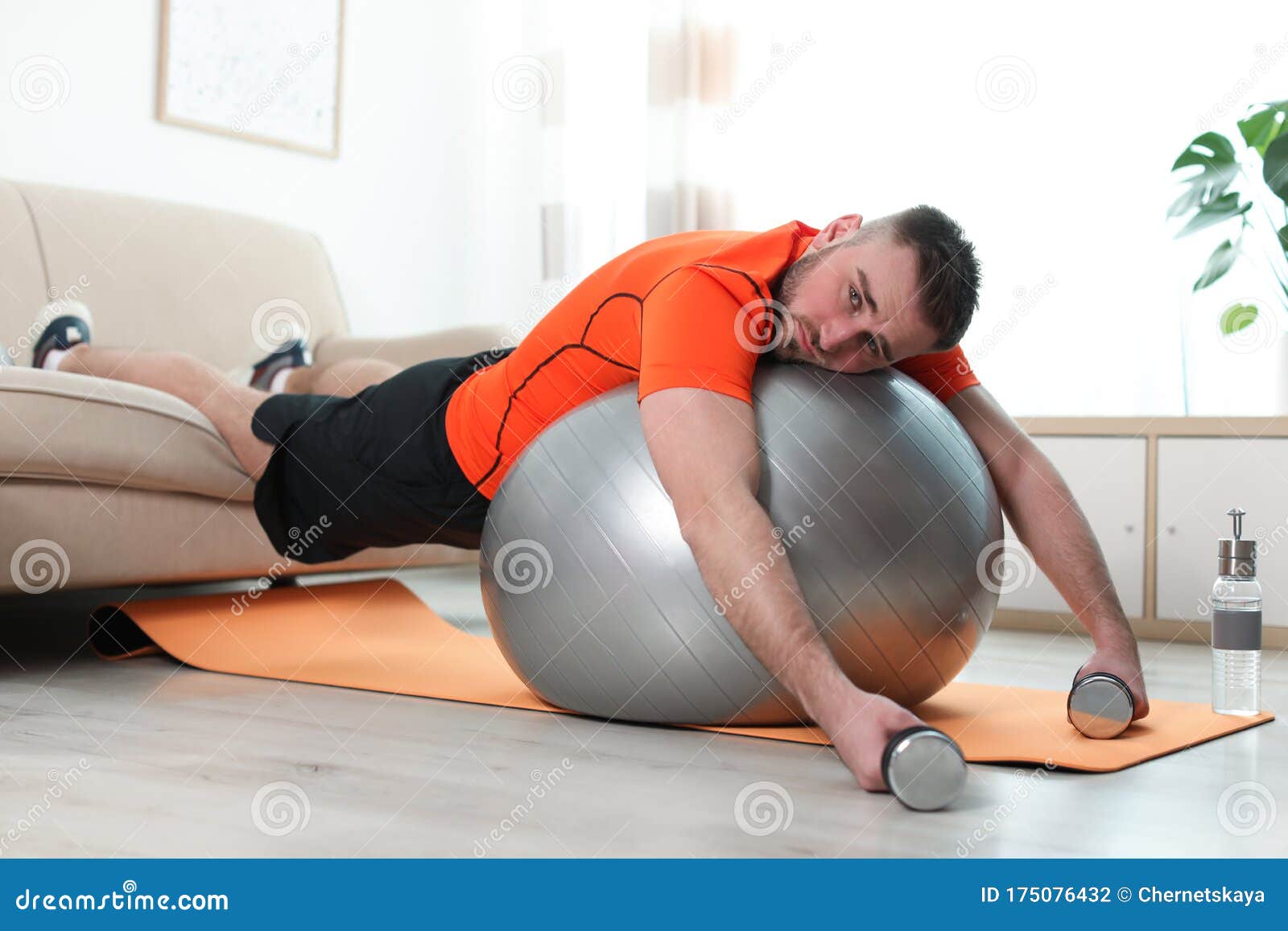Lazy Young Man with Sport Equipment at Home Stock Photo - Image of male ... Lazy Young Man with Sport Equipment at Home Stock Photo - Image of male ...