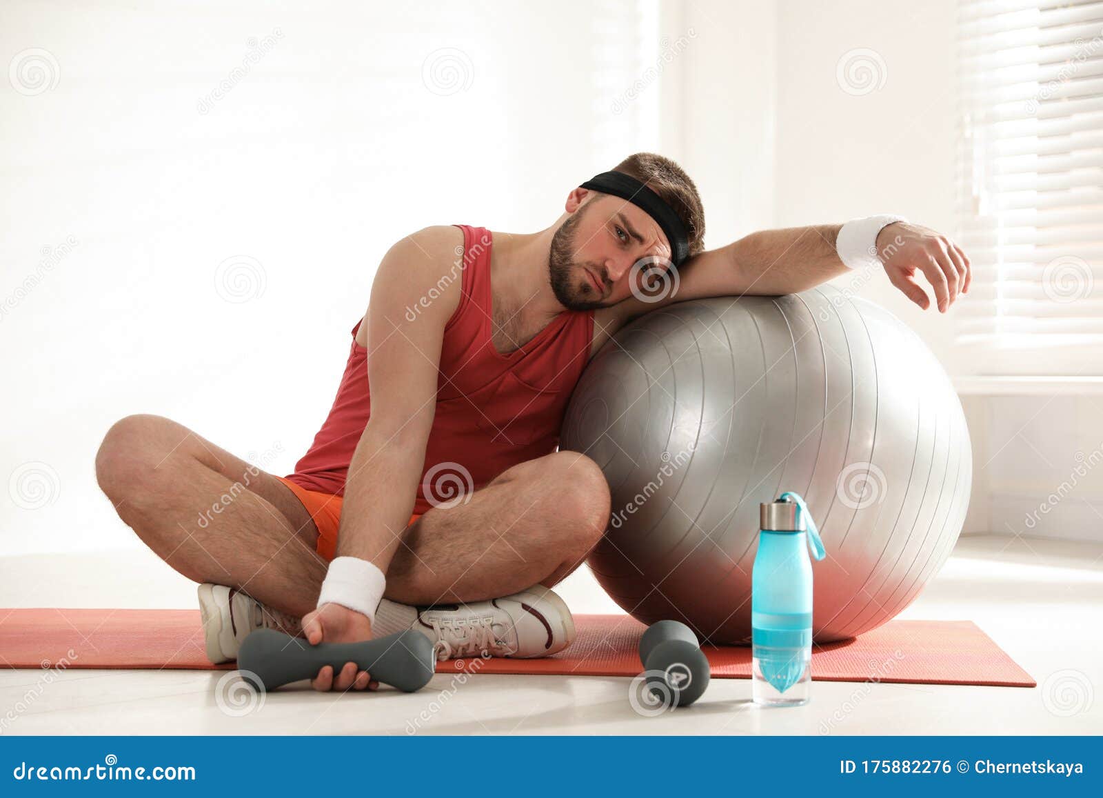 Lazy Young Man with Sport Equipment Stock Photo - Image of body, person ... Lazy Young Man with Sport Equipment Stock Photo - Image of body, person ...