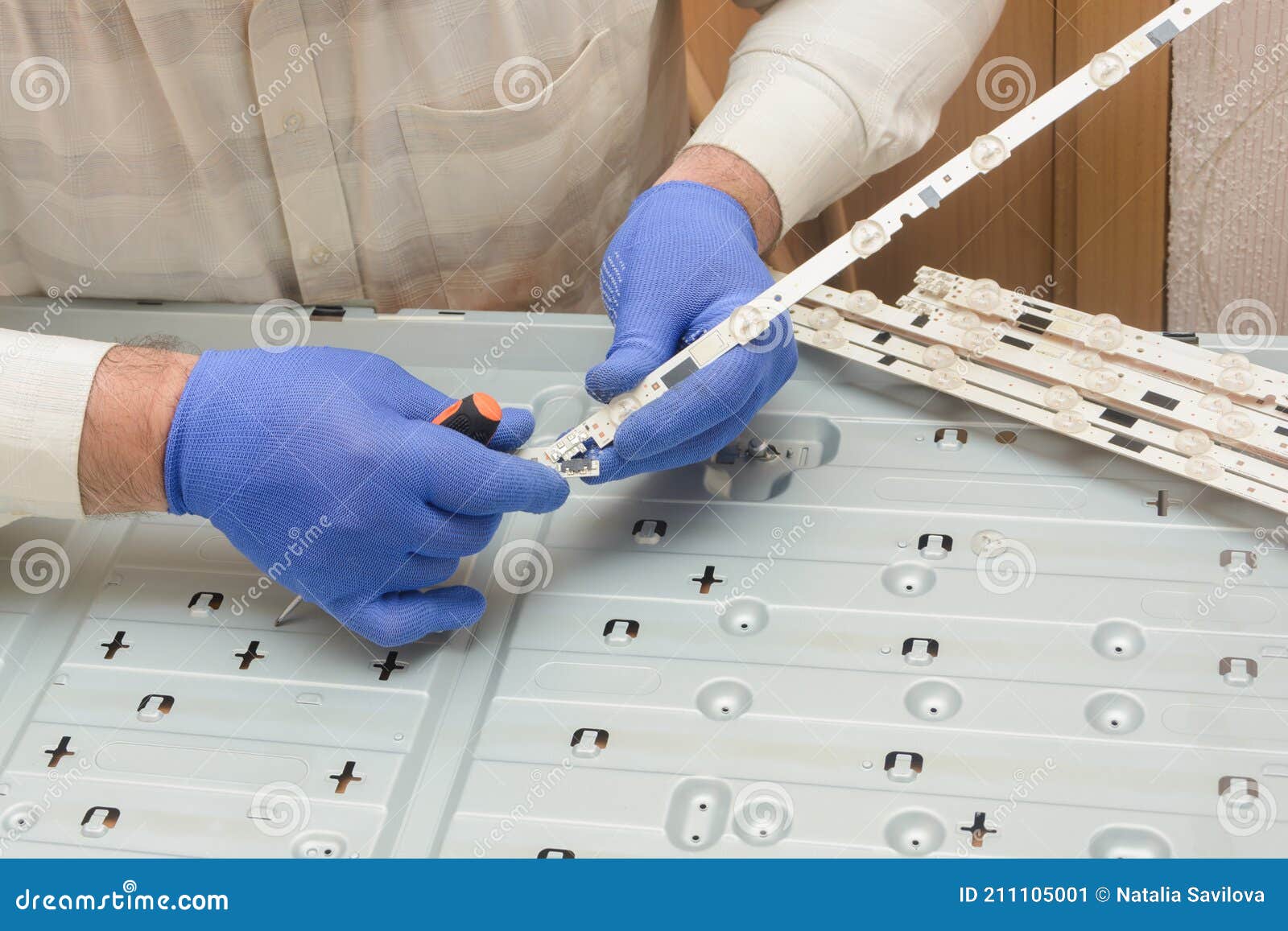 LCD TV Repair. Engineer Assembles LED Board with Lamps for Large Tv ...