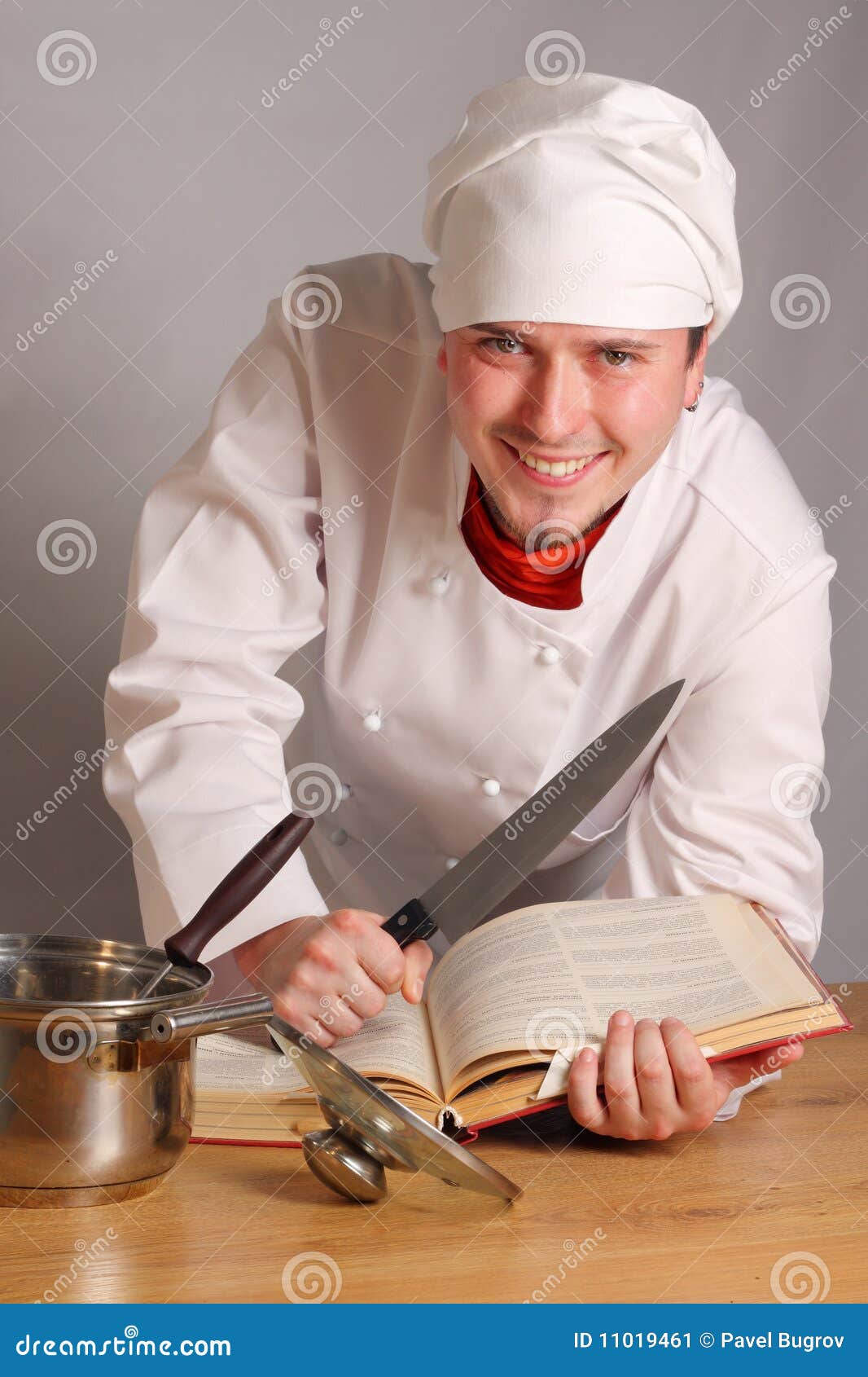 Le Cuisinier Avec Un Couteau Image stock - Image du chapeau, couteau ...
