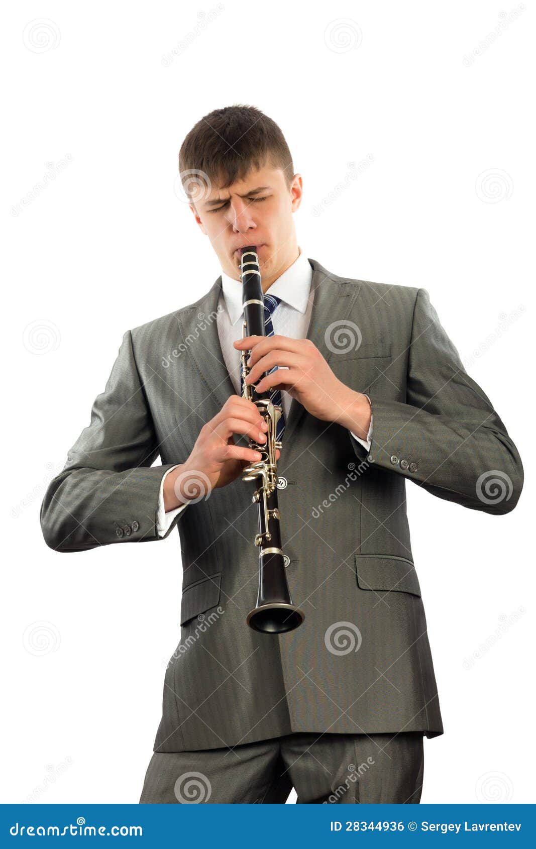 Le Jeune Musicien Joue La Clarinette Photo stock - Image du instrument ...