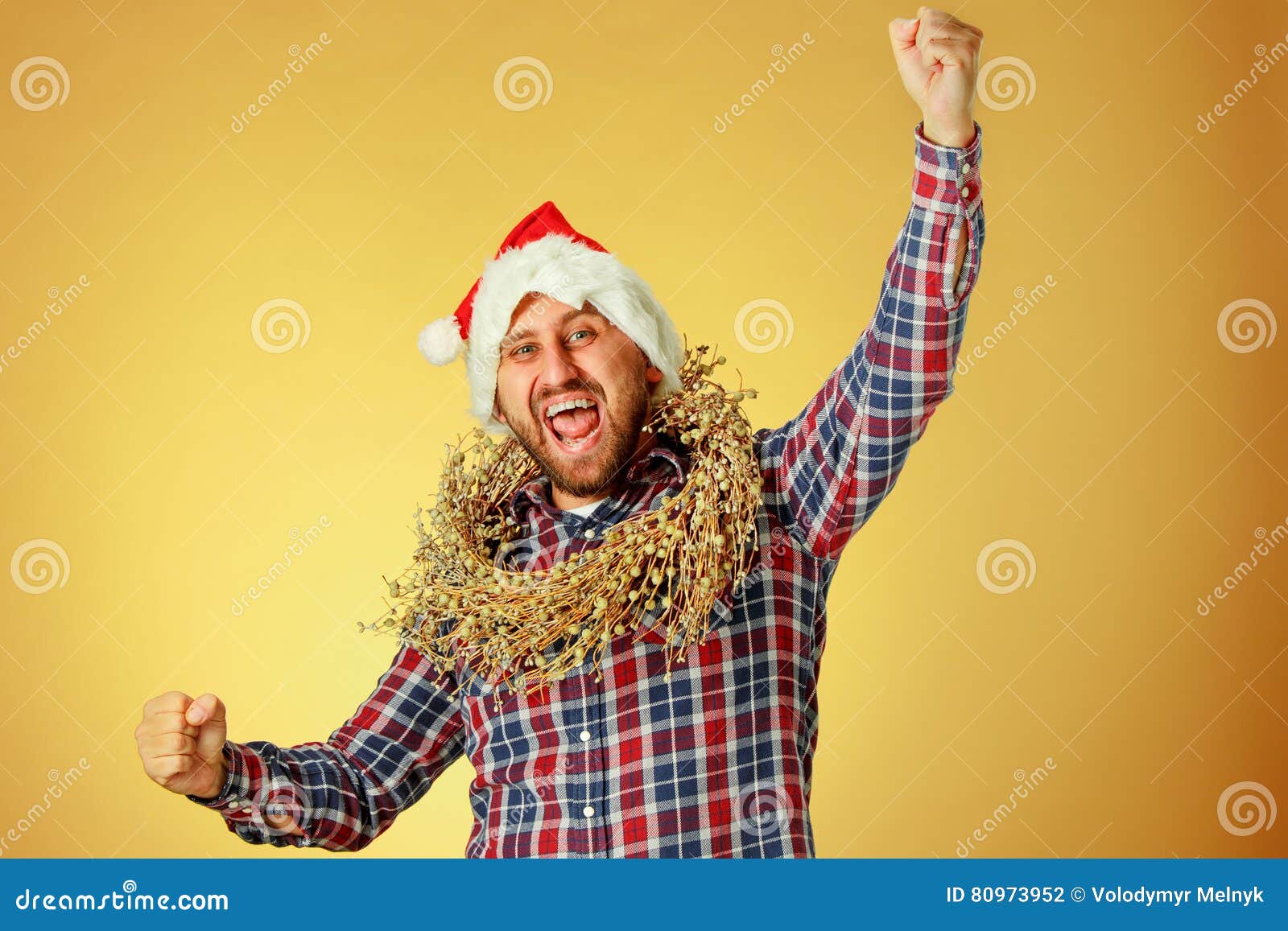 Le Julman Som Slitage En Santa Hatt Arkivfoto - Bild av gladlynt, grabb ...