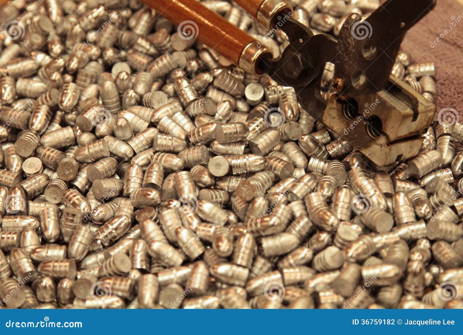 Lead Bullets and Mold for Reloading Ammunition Stock Photo - Image of ...