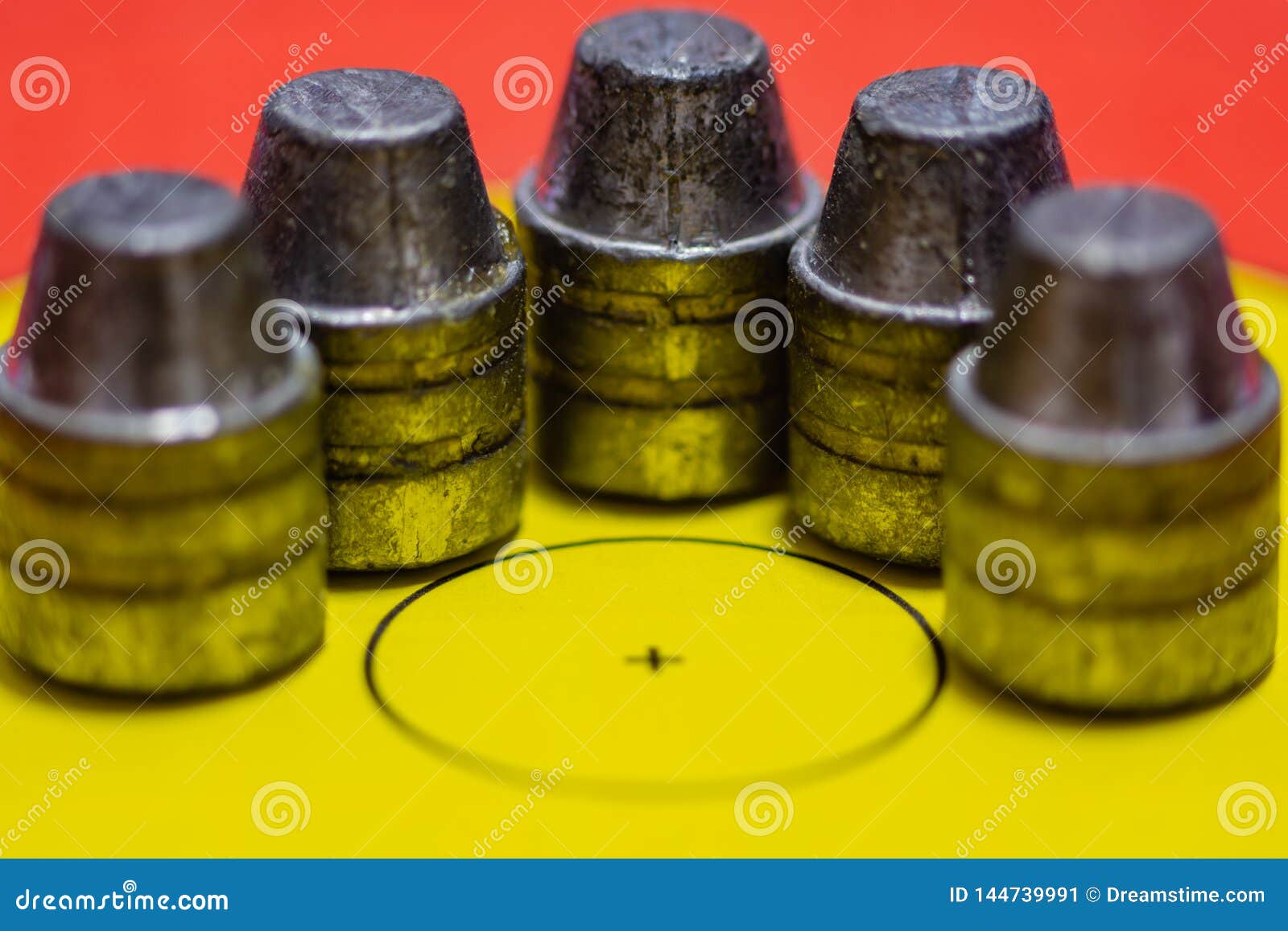 Lead Bullets on a Target Face Stock Image - Image of crack, caliber ...