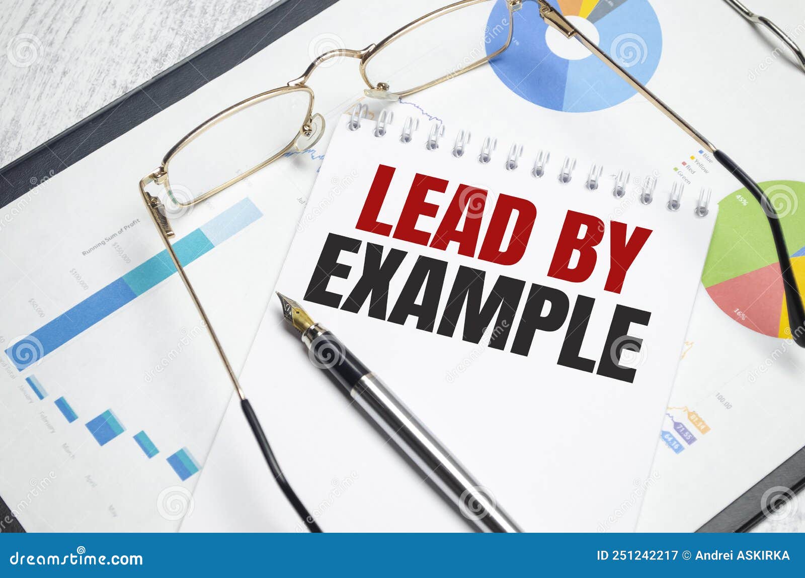 Lead by Example. Office Table Desk with Supplies, White Blank Note Pad ...