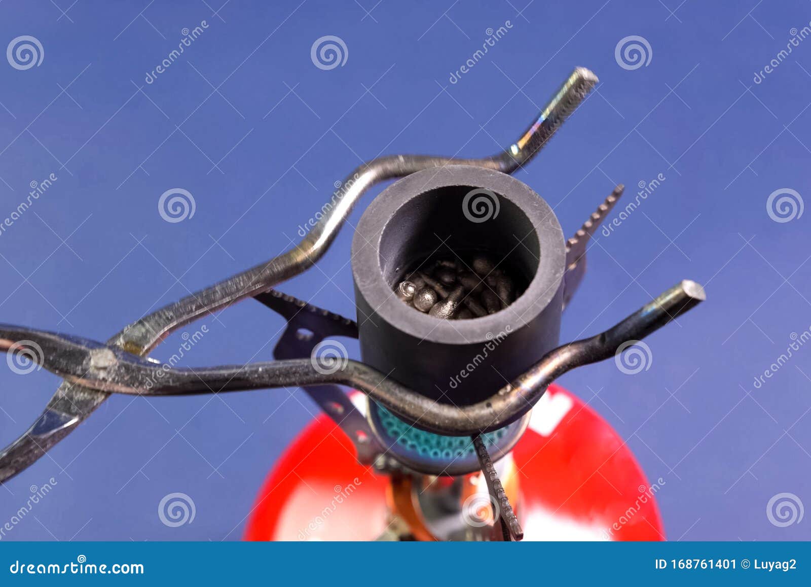 Lead melting, molten lead stock image. Image of pattern - 168761401