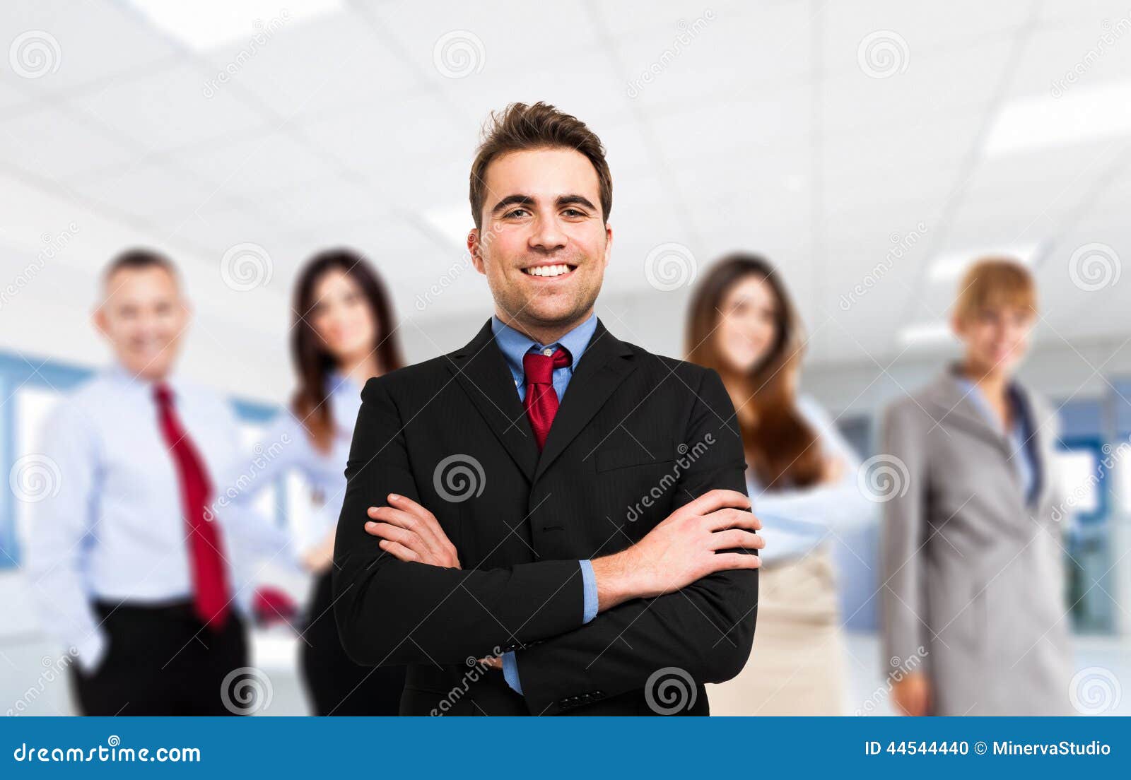 Leader in Front of His Team Stock Photo - Image of crossed, expression ...
