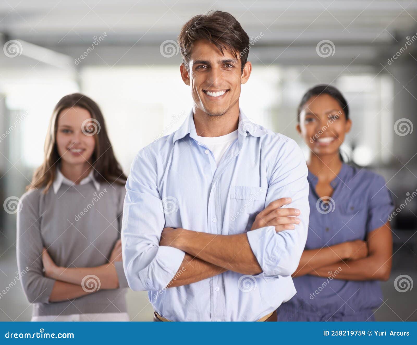 The Leader of the Pack. a Young Business Team Standing with Arms Folded ...