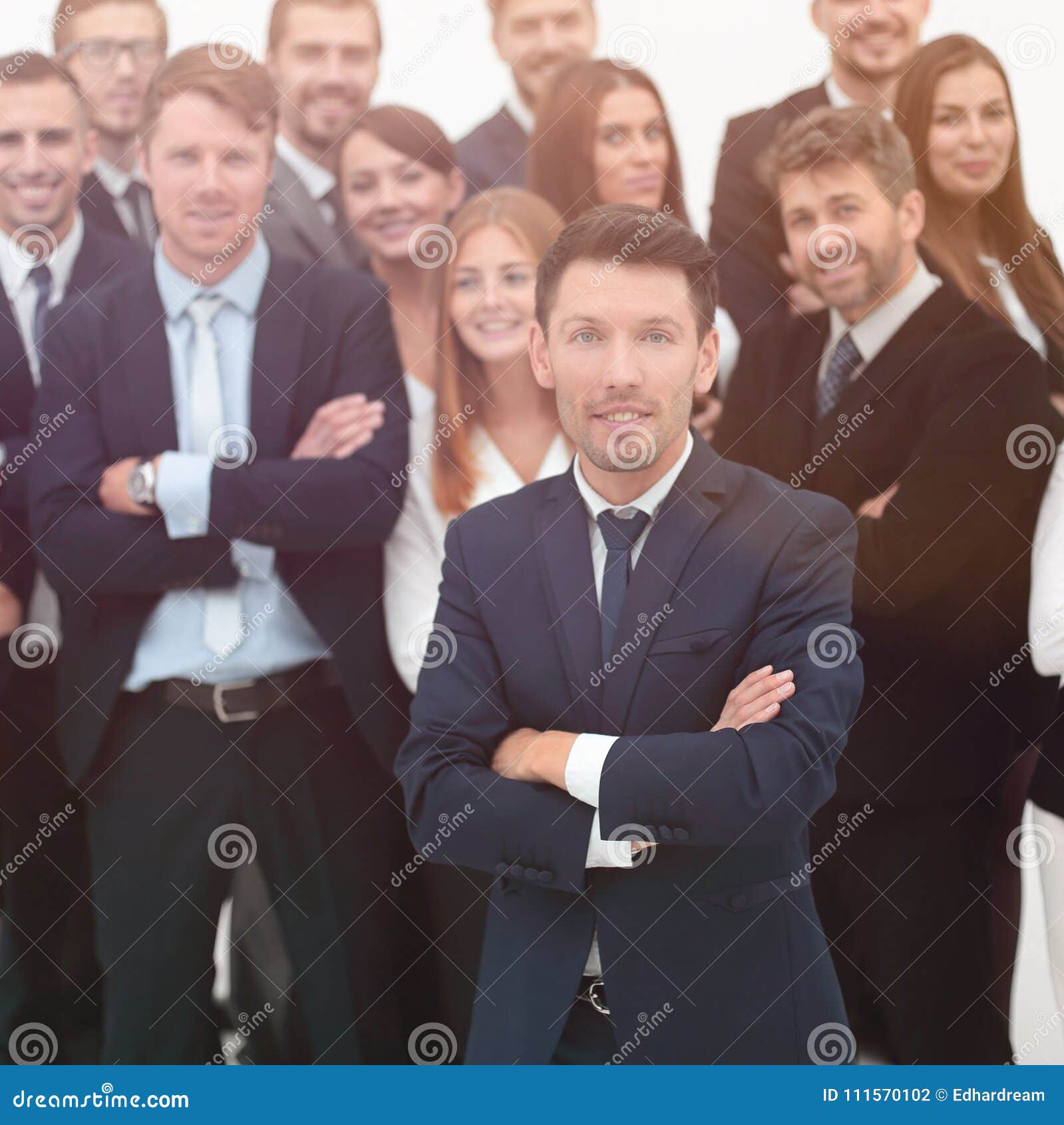 Leader Standing in Front of a Large Business Team Stock Photo - Image ...