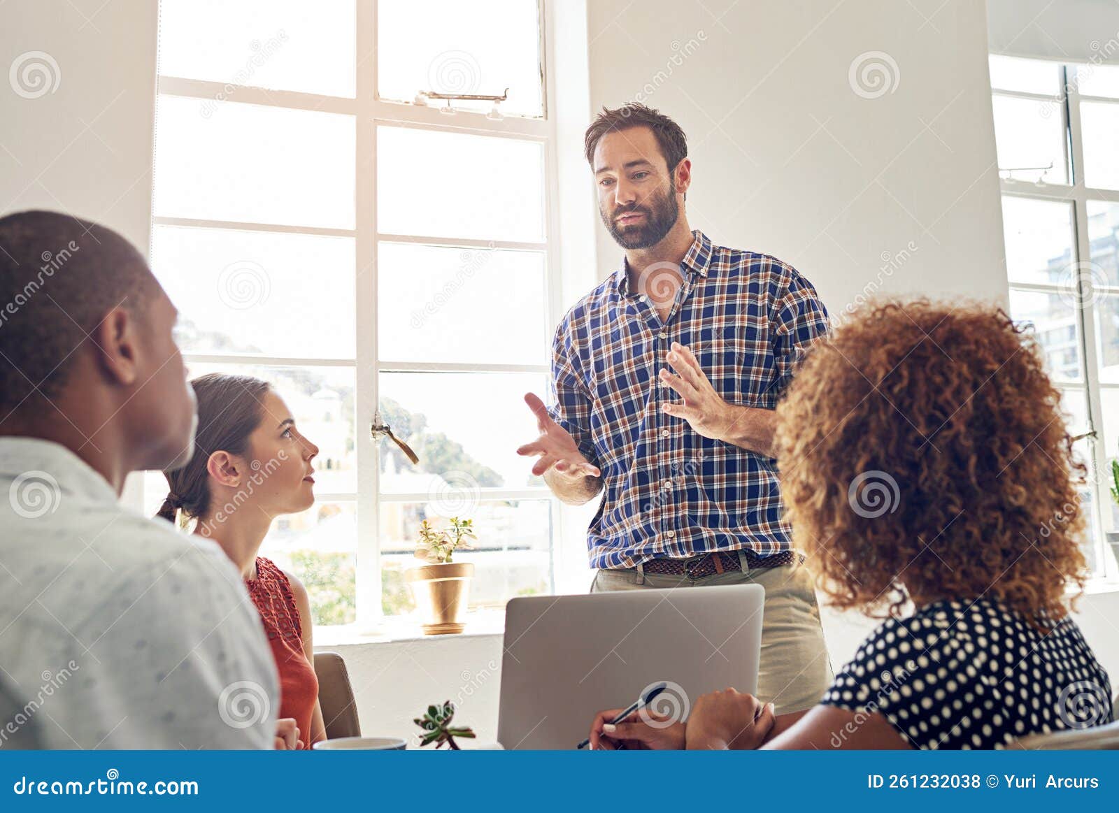 He always Leads His Team by Example. a Group of Colleagues Having a ...