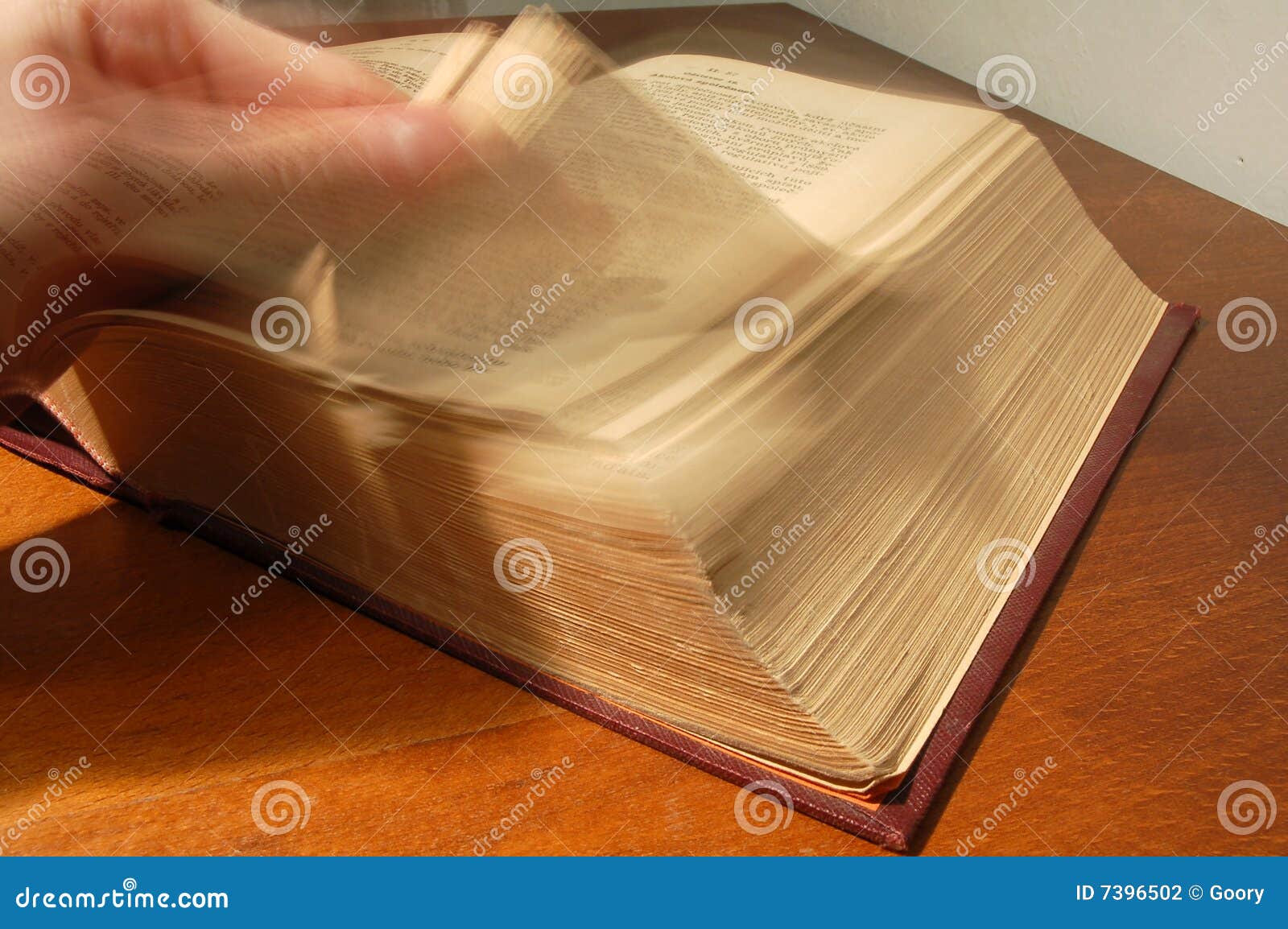 Leafing through the book stock photo. Image of metaphor - 7396502