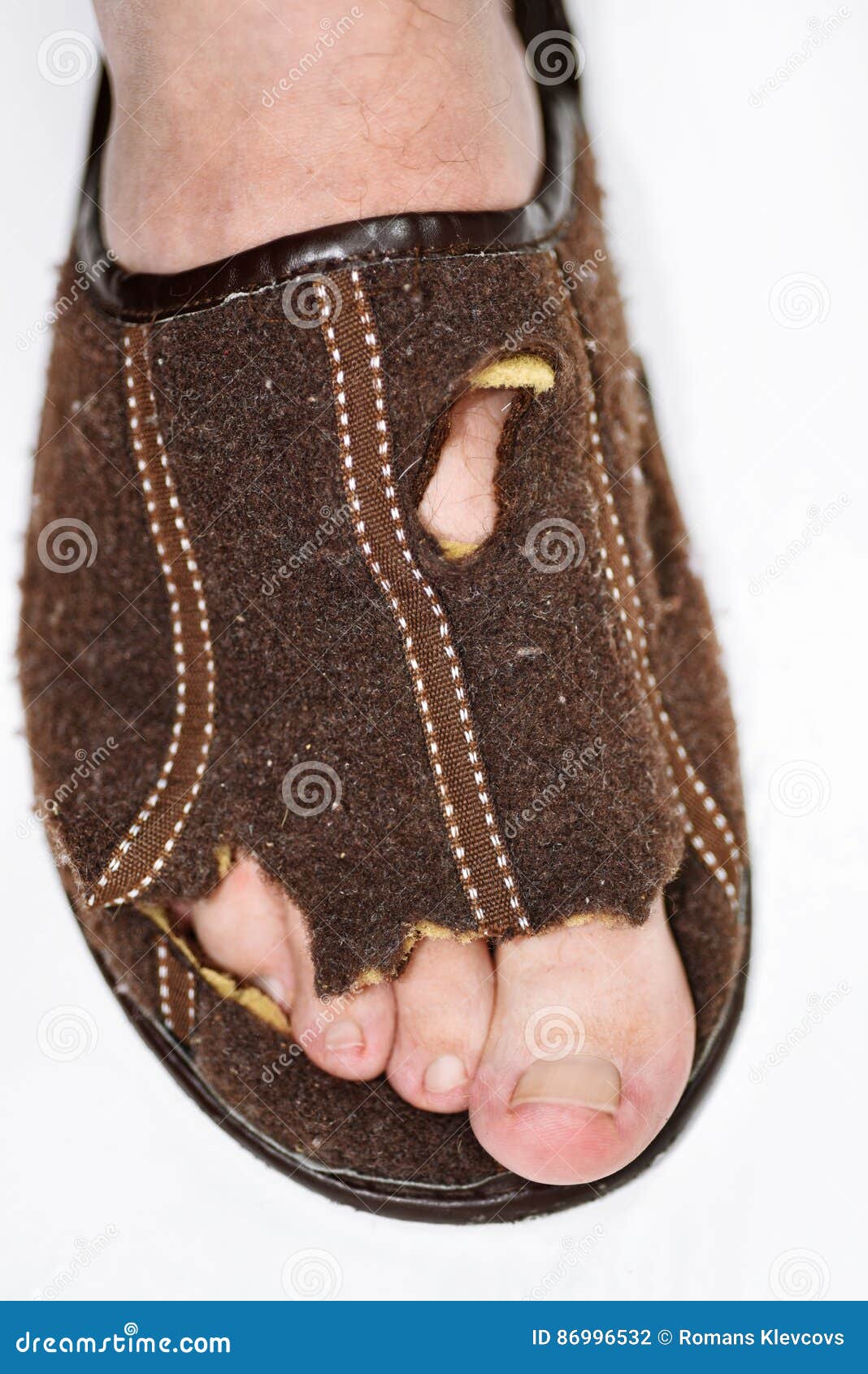 Leaky brown slippers. stock photo. Image of beggar, design - 86996532