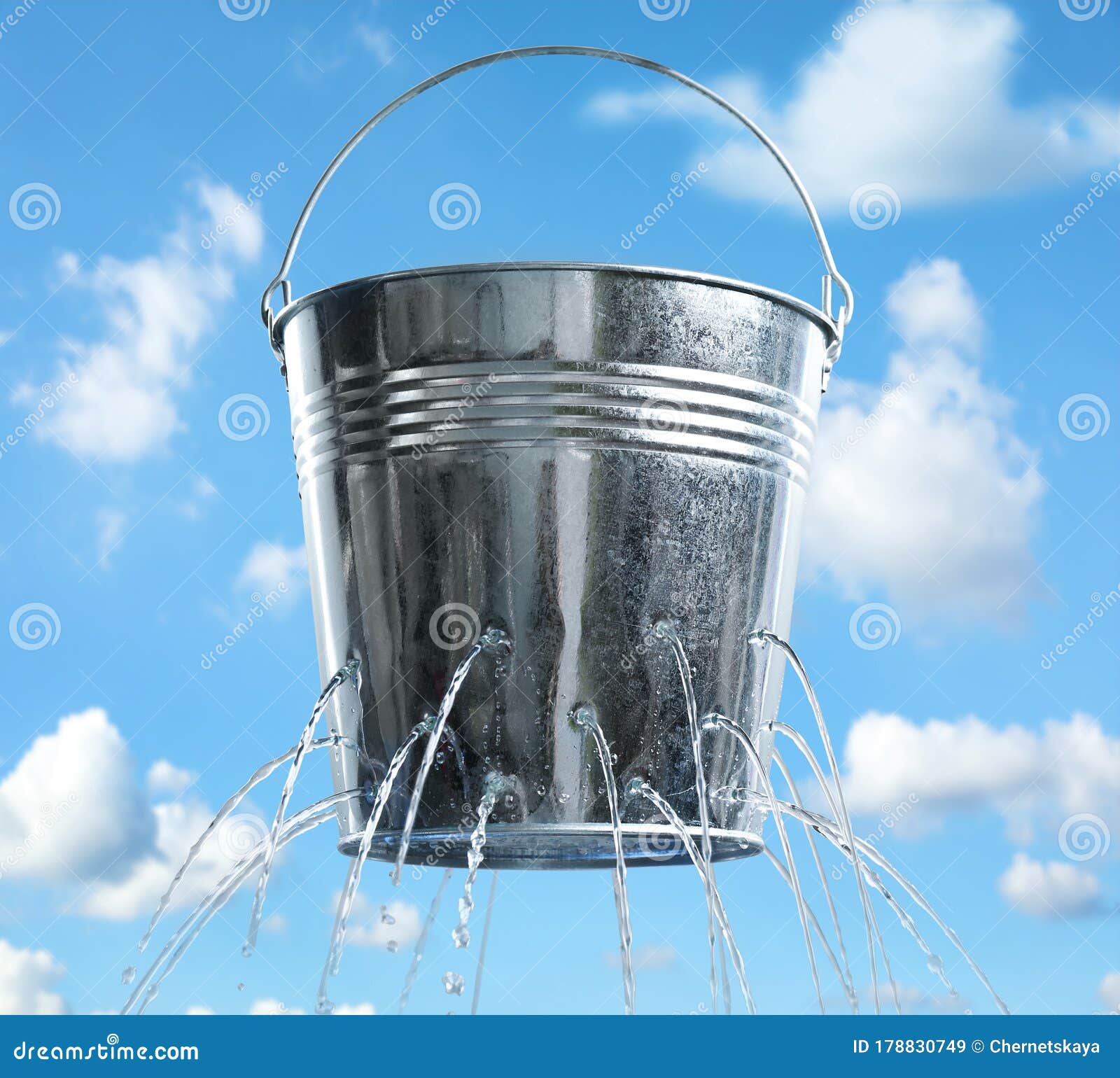 Leaky Bucket with Water Against Sky Stock Image - Image of cloudy ...
