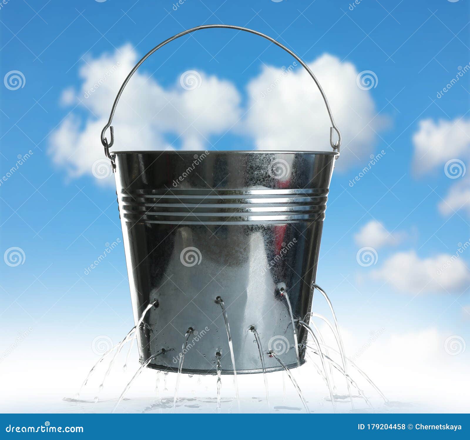 Leaky Bucket with Water Against Sky Stock Photo - Image of bucket ...