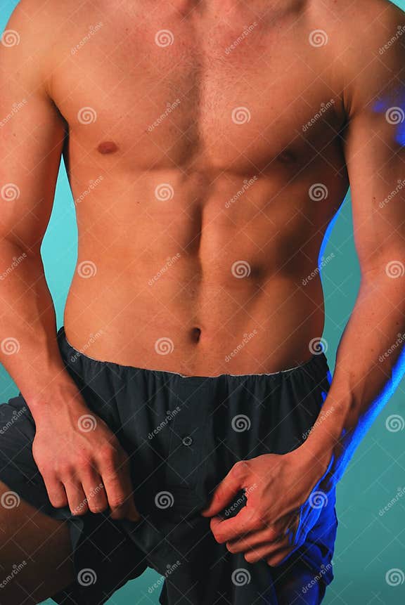 Lean male torso in blue 2 stock photo. Image of nude, underwear - 2239960