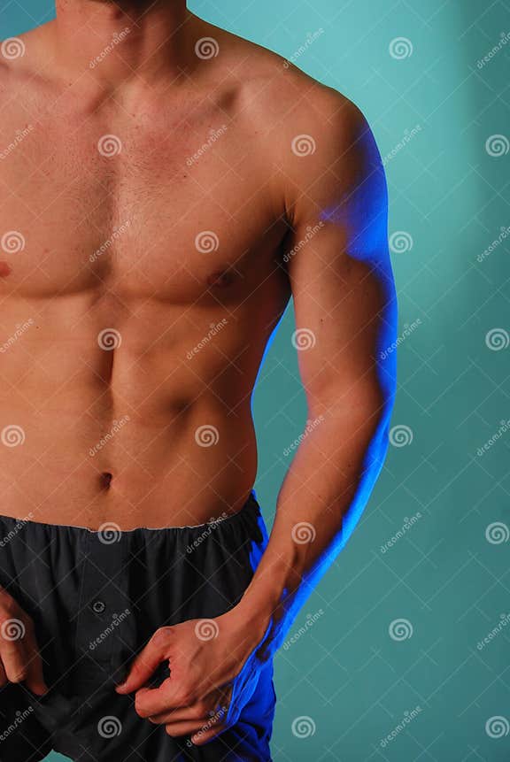 Lean male torso in blue stock photo. Image of power, skin - 2239950