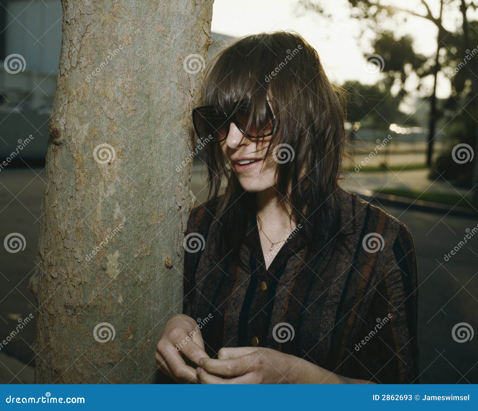 Leaning against tree stock image. Image of gestures, model - 2862693