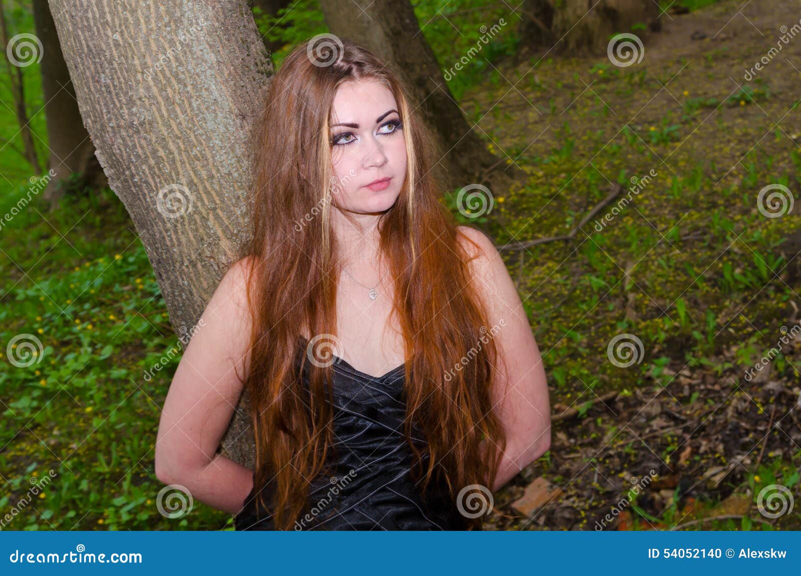 She is Leaning Back Against the Tree Stock Photo - Image of ambient ...