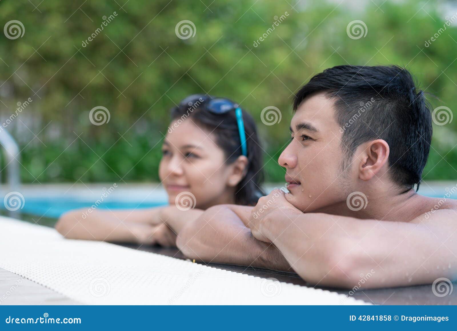 Leaning on poolside stock photo. Image of fresh, portrait - 42841858