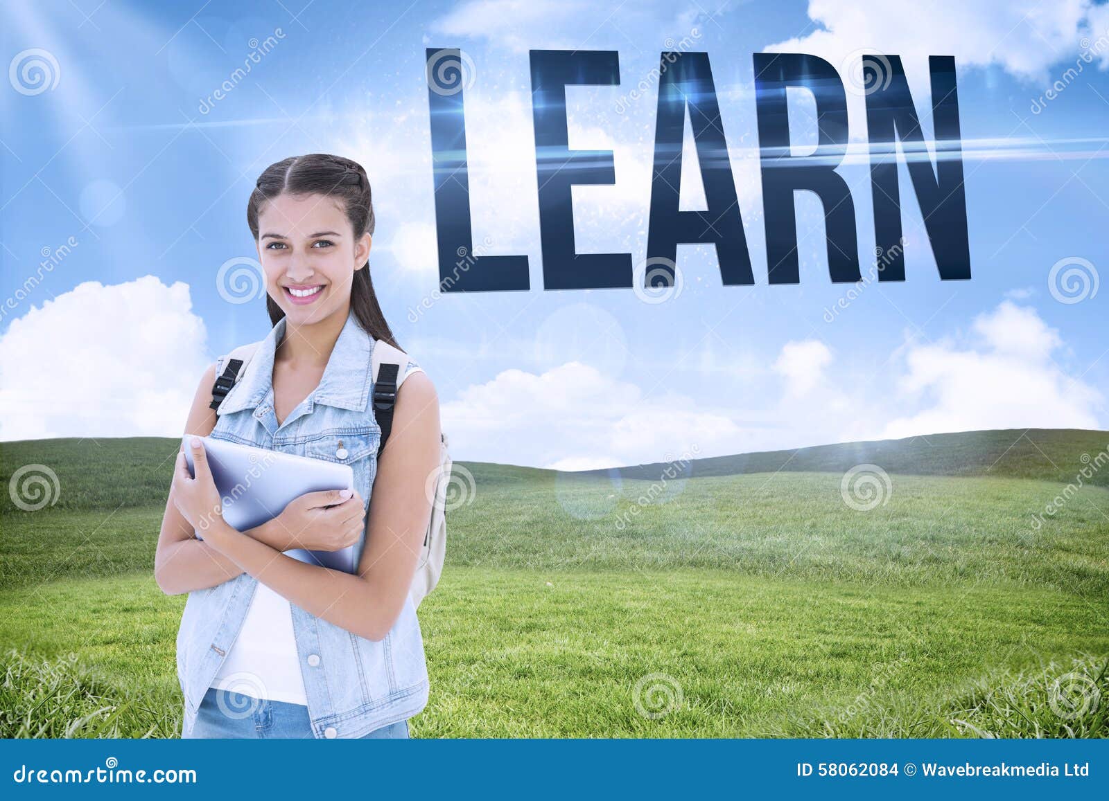 Learn Against Blue Sky Over Green Field Stock Photo - Image of tablet ...