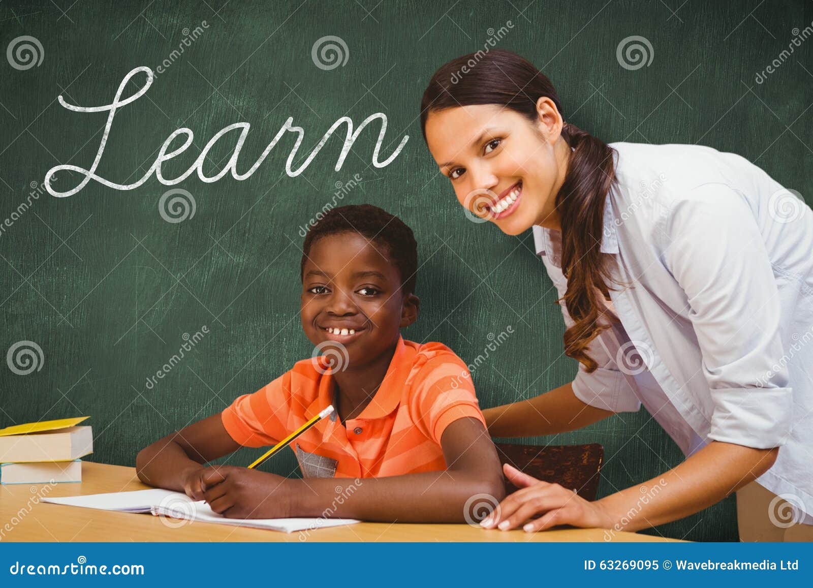 Learn Against Green Chalkboard Stock Image - Image of book, holding ...