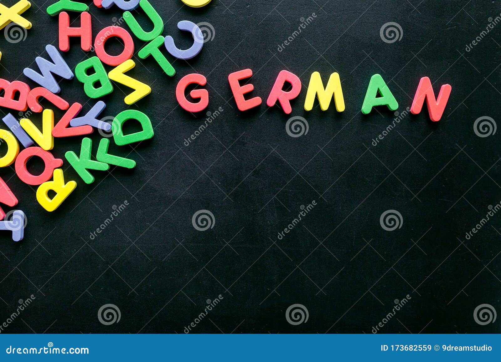 Learn German. Concept with Letters on Black Background Top-down Copy ...
