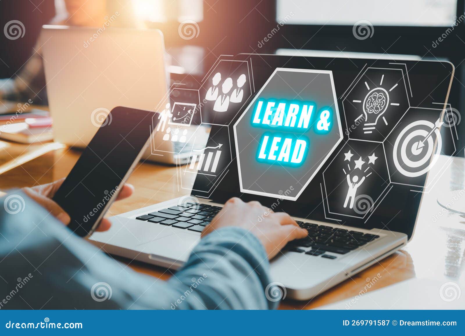 Person Using Laptop Computer with Learn and Lead Icon on Vitual Screen ...