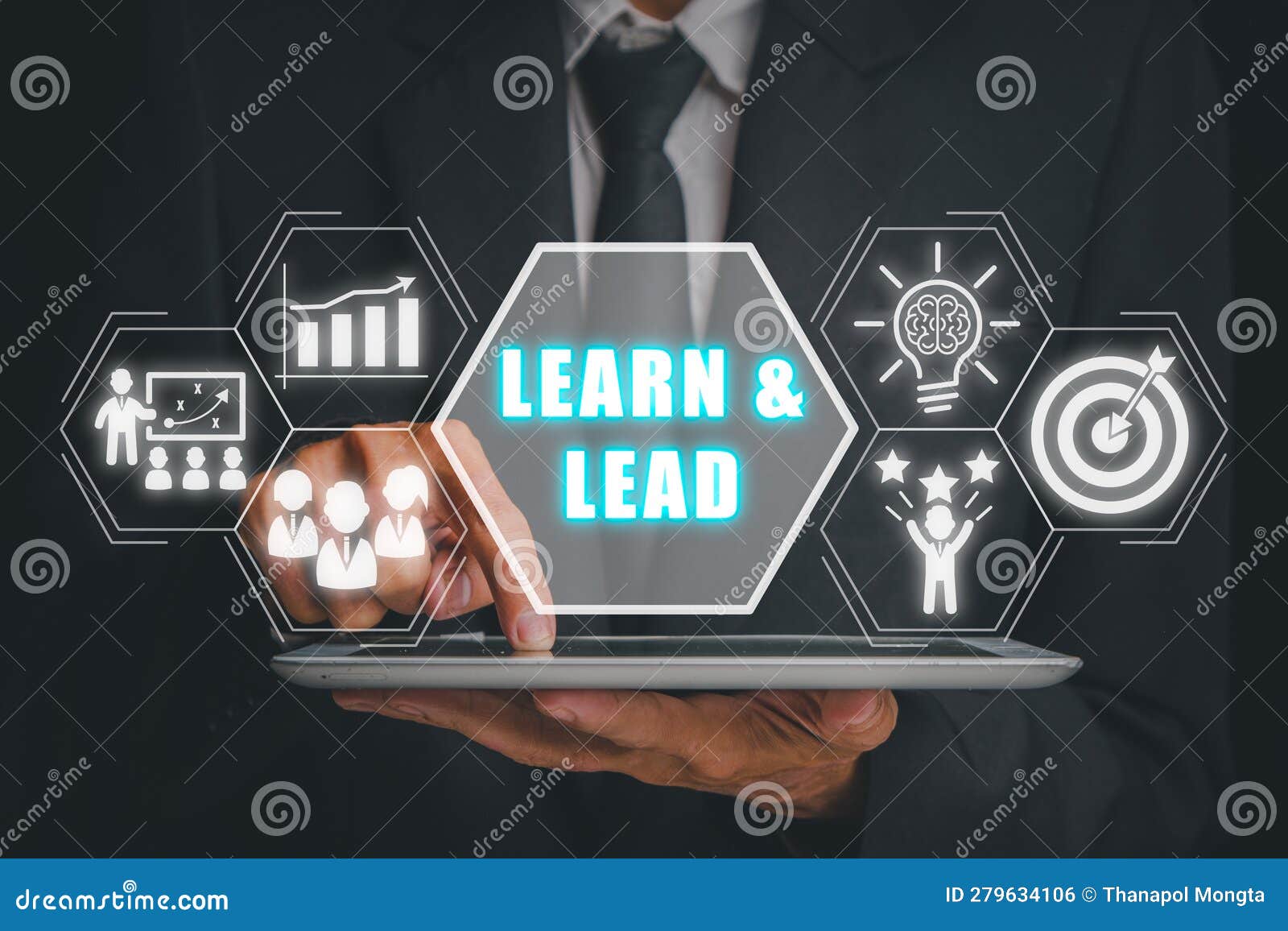 Person Using Tablet Computer with Learn and Lead Icon on Vitual Screen ...
