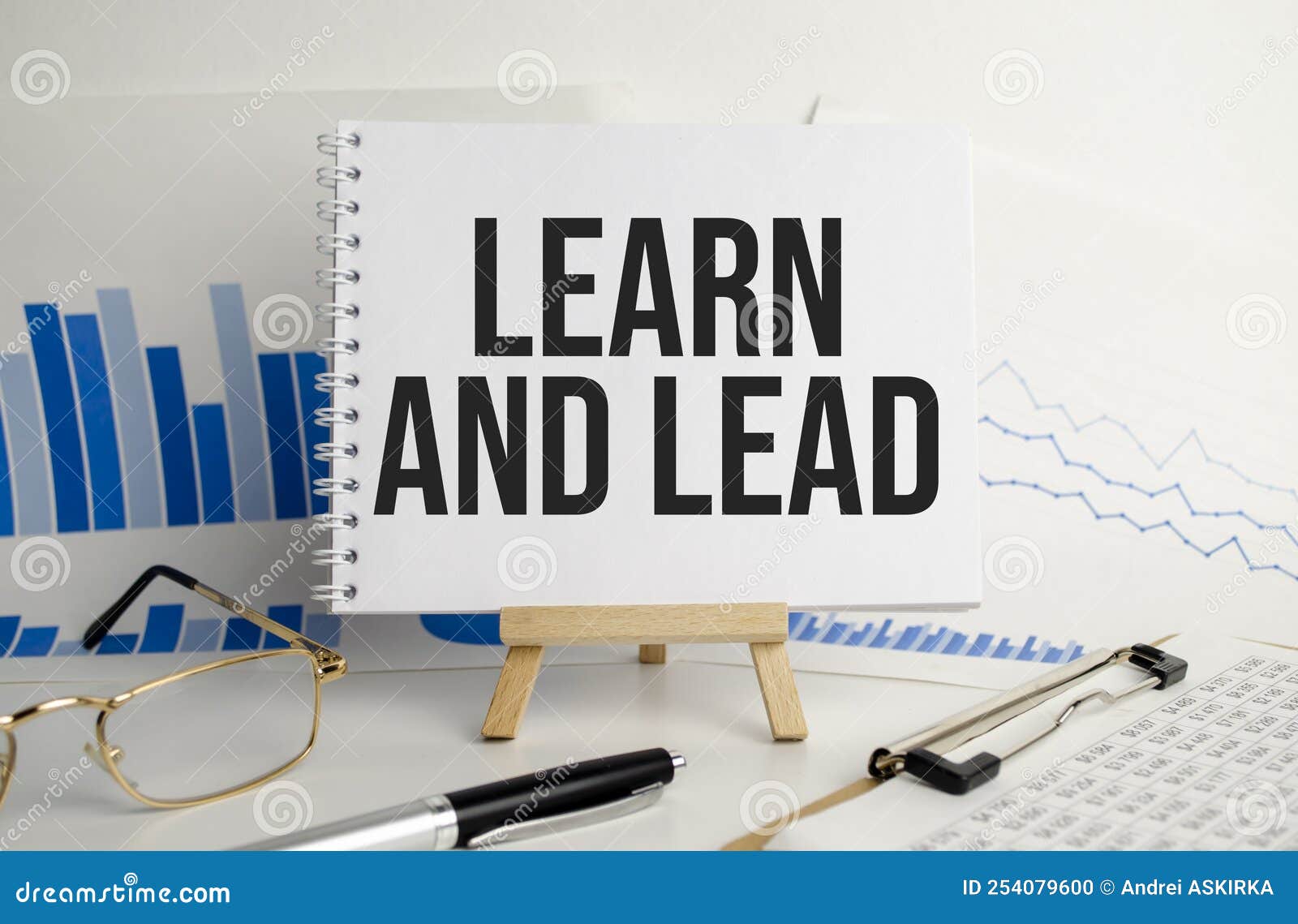 Learn and Lead Words with Charts, Glasses and Notepad Stock Photo ...