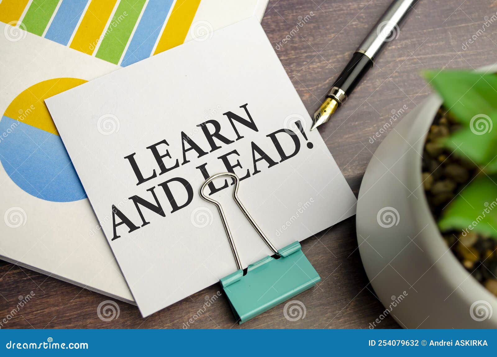 Learn and Lead Words with Charts, Pen and Green Plant Stock Photo ...