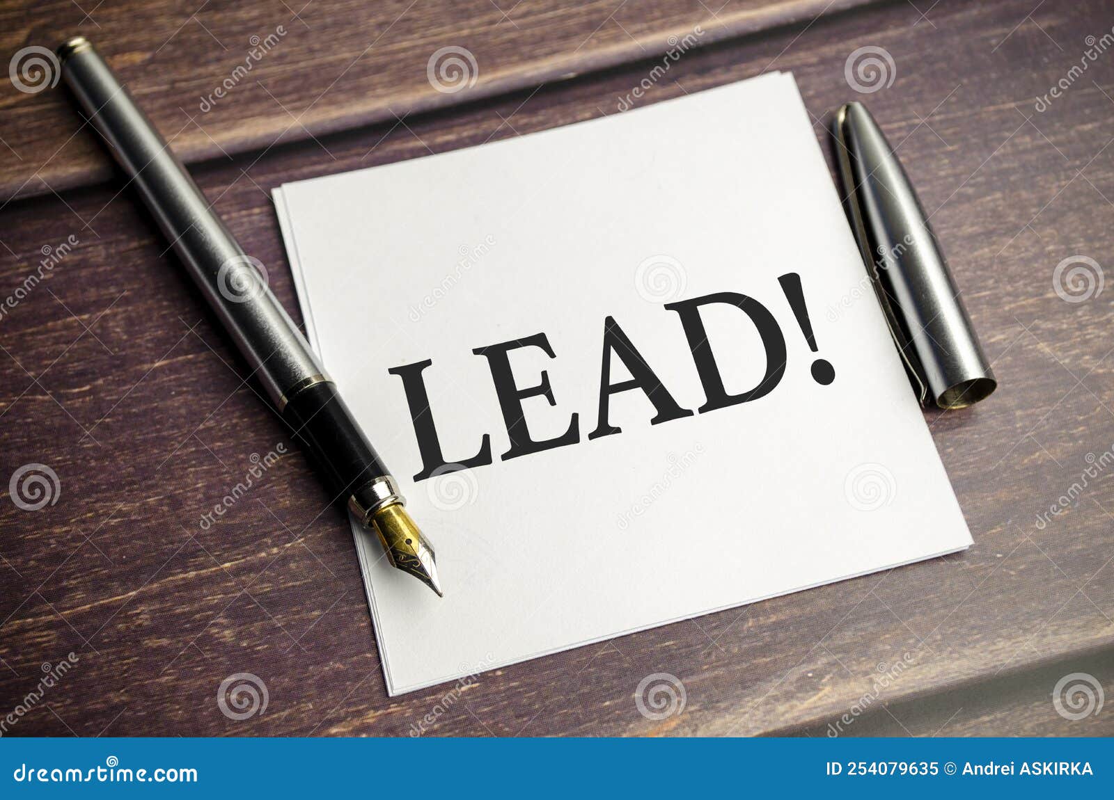 Learn and Lead Words with Pen on Brown Wooden Background Stock Image ...