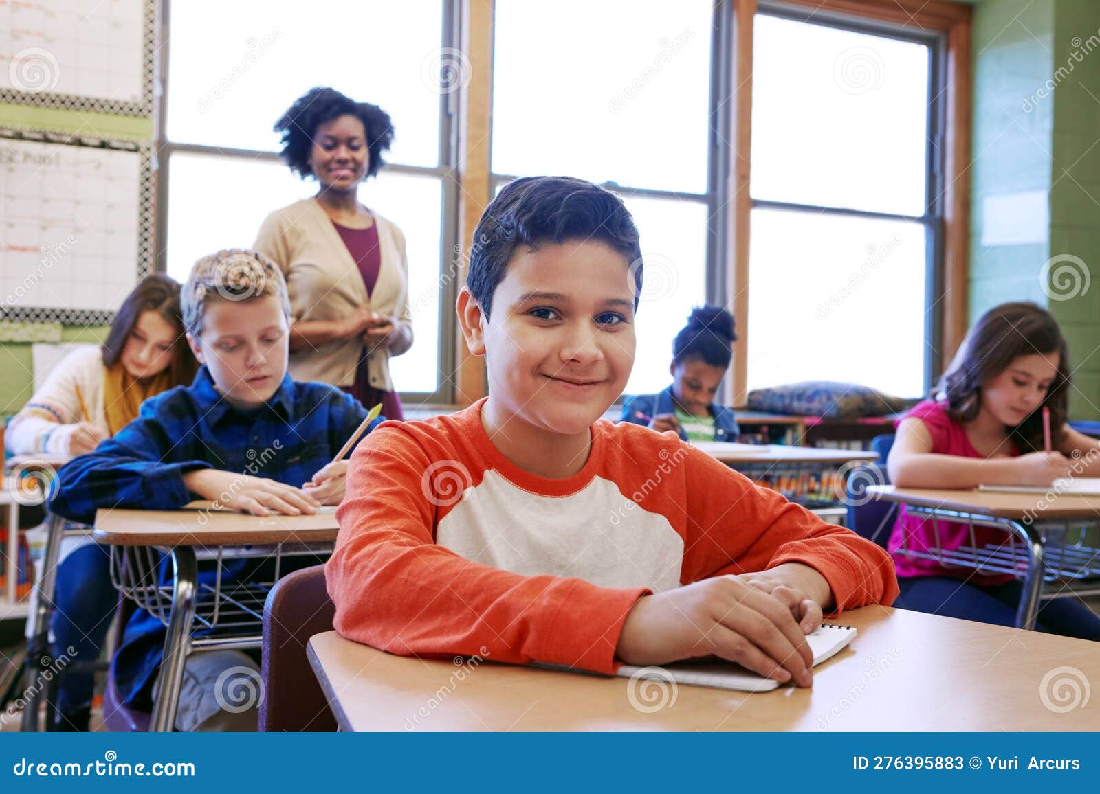 We Learn for Life Not Just for a Test. a Young Boy Sitting in Class ...