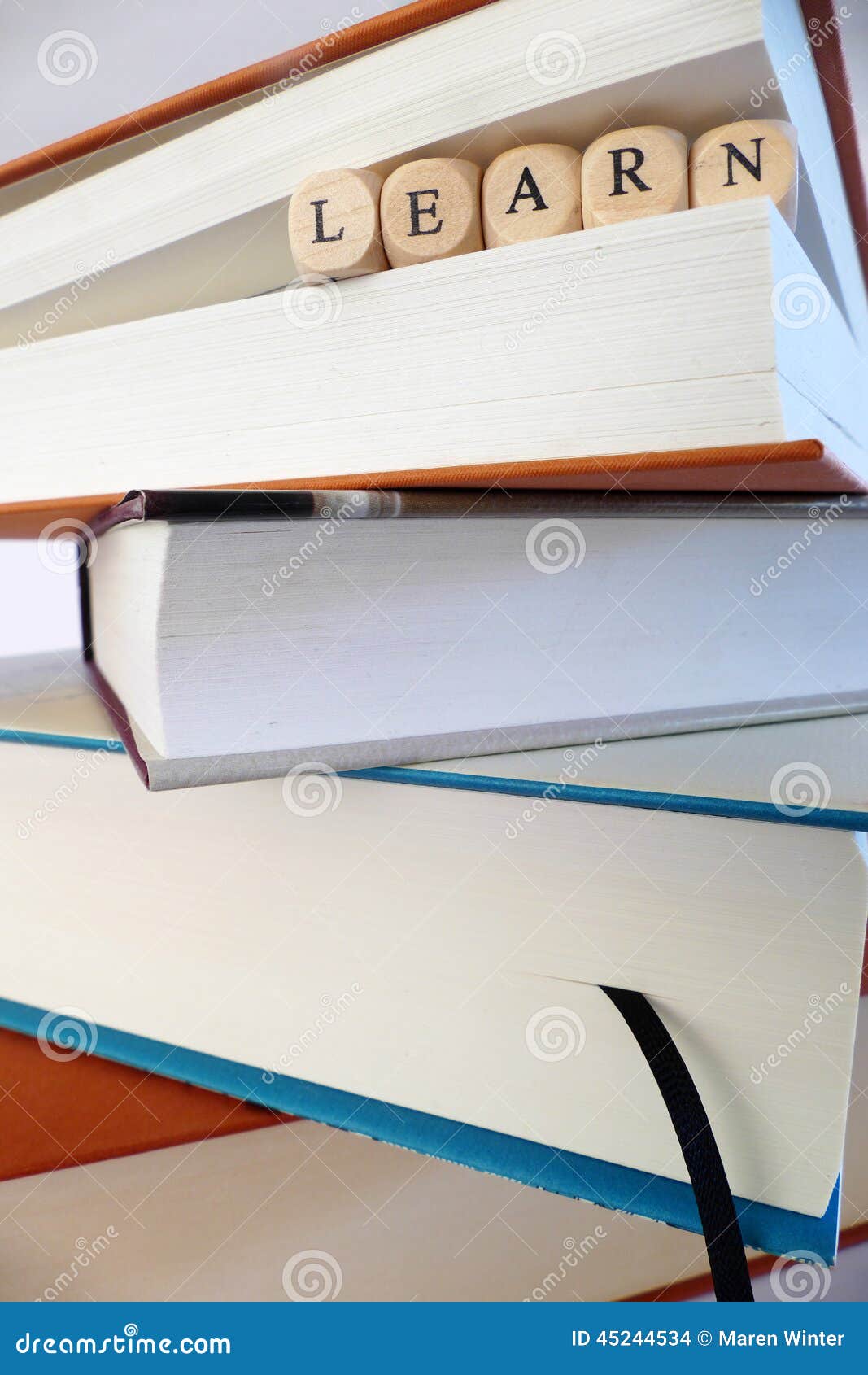 Learn Message Written in Wooden Blocks between Pages of a Book Stock ... Learn Message Written in Wooden Blocks between Pages of a Book Stock ...