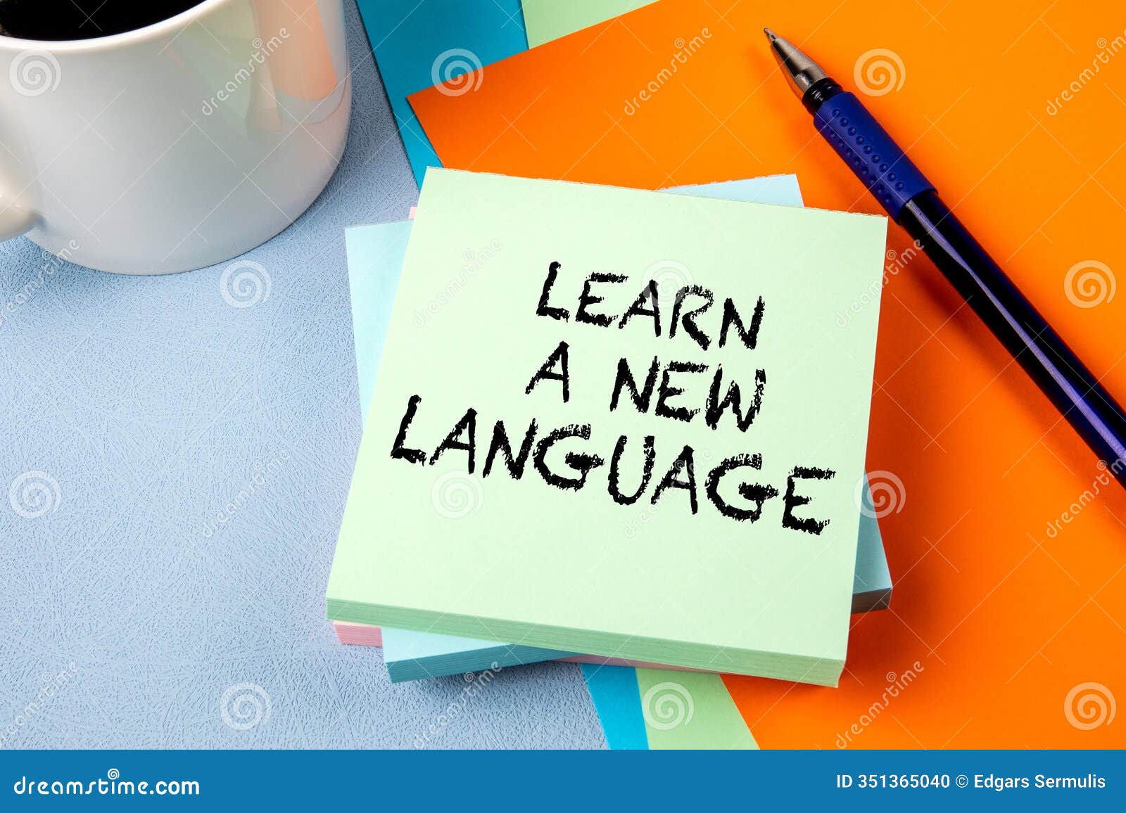 LEARN a NEW LANGUAGE. Notepad with Text on Office Table Stock Photo ...