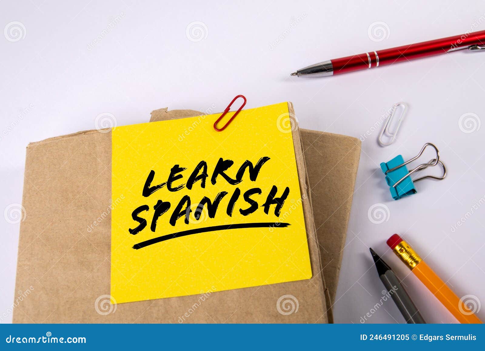 Learn Spanish. Textbooks and Stationery on a White Background Stock ...