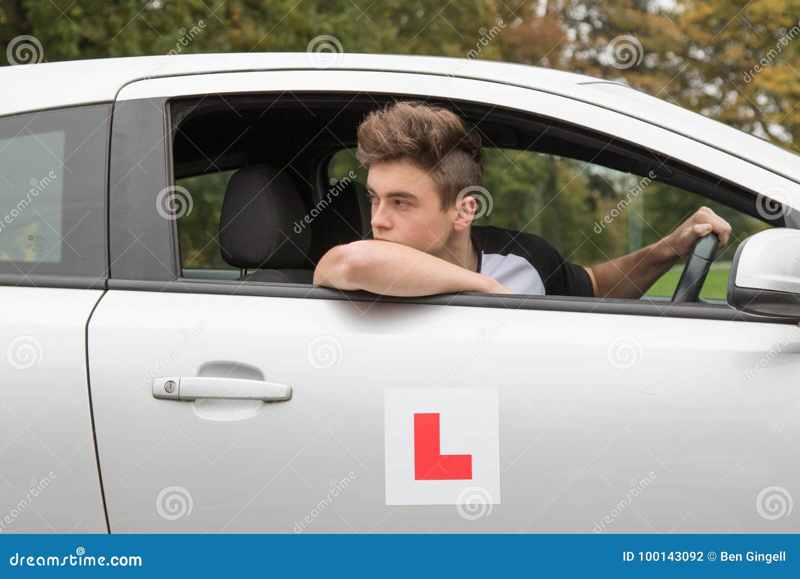 Learner Driver in his car stock photo. Image of teenager - 100143092