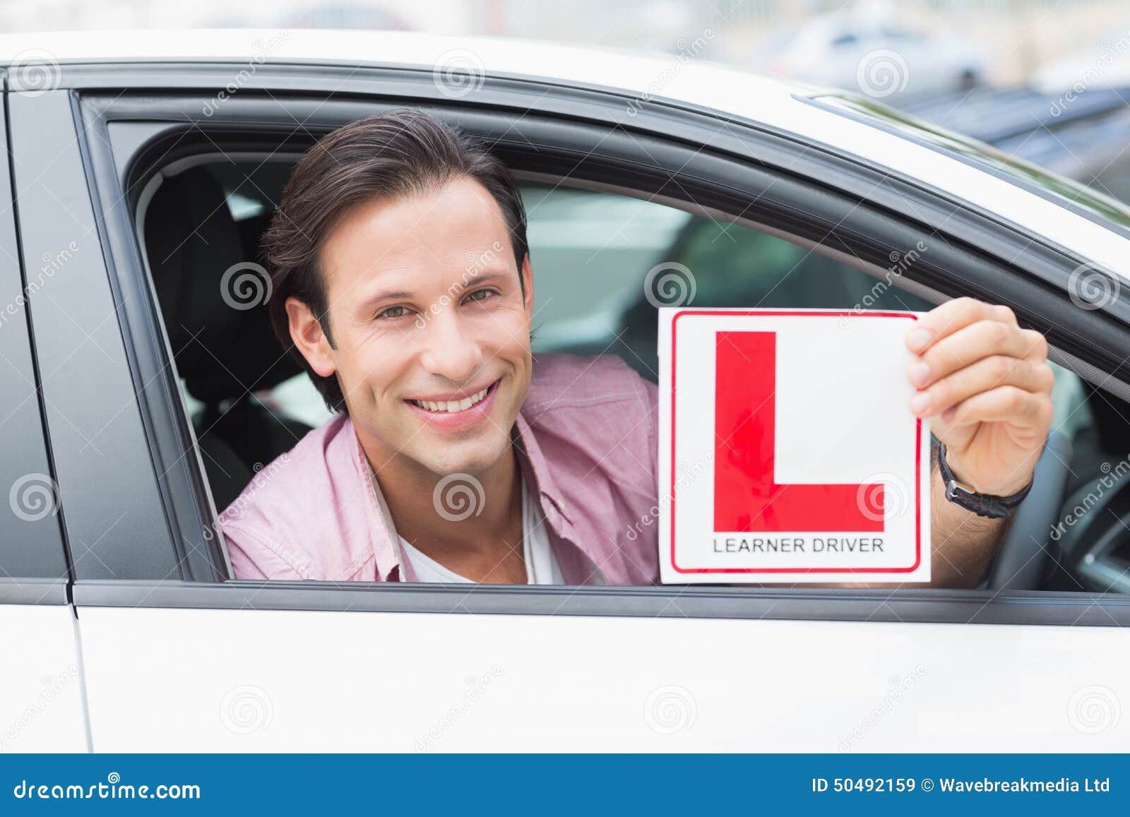 Learner Driver Smiling and Holding L Plate Stock Image - Image of ...