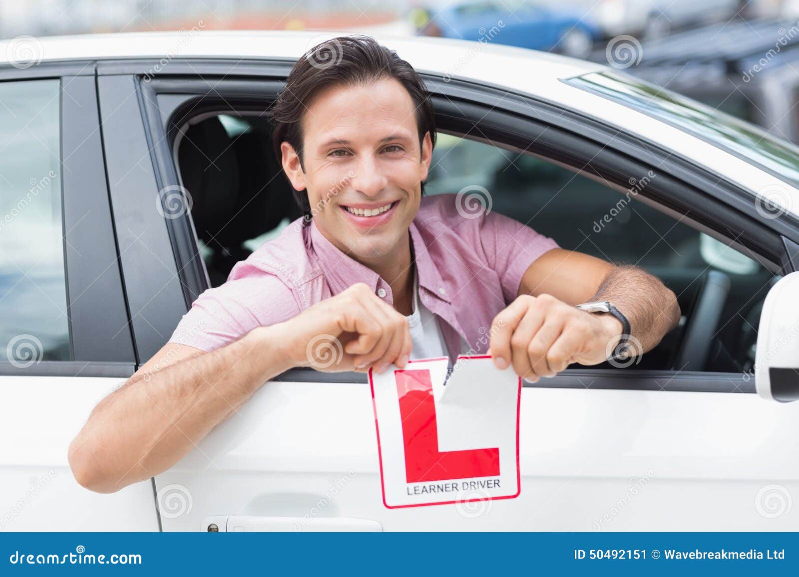 Learner Driver Smiling and Tearing L Plate Stock Image - Image of ...