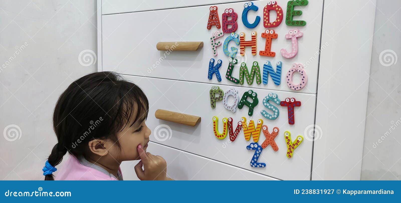 Learning Alphabet for Kids on the Cabinet Stock Image - Image of ...