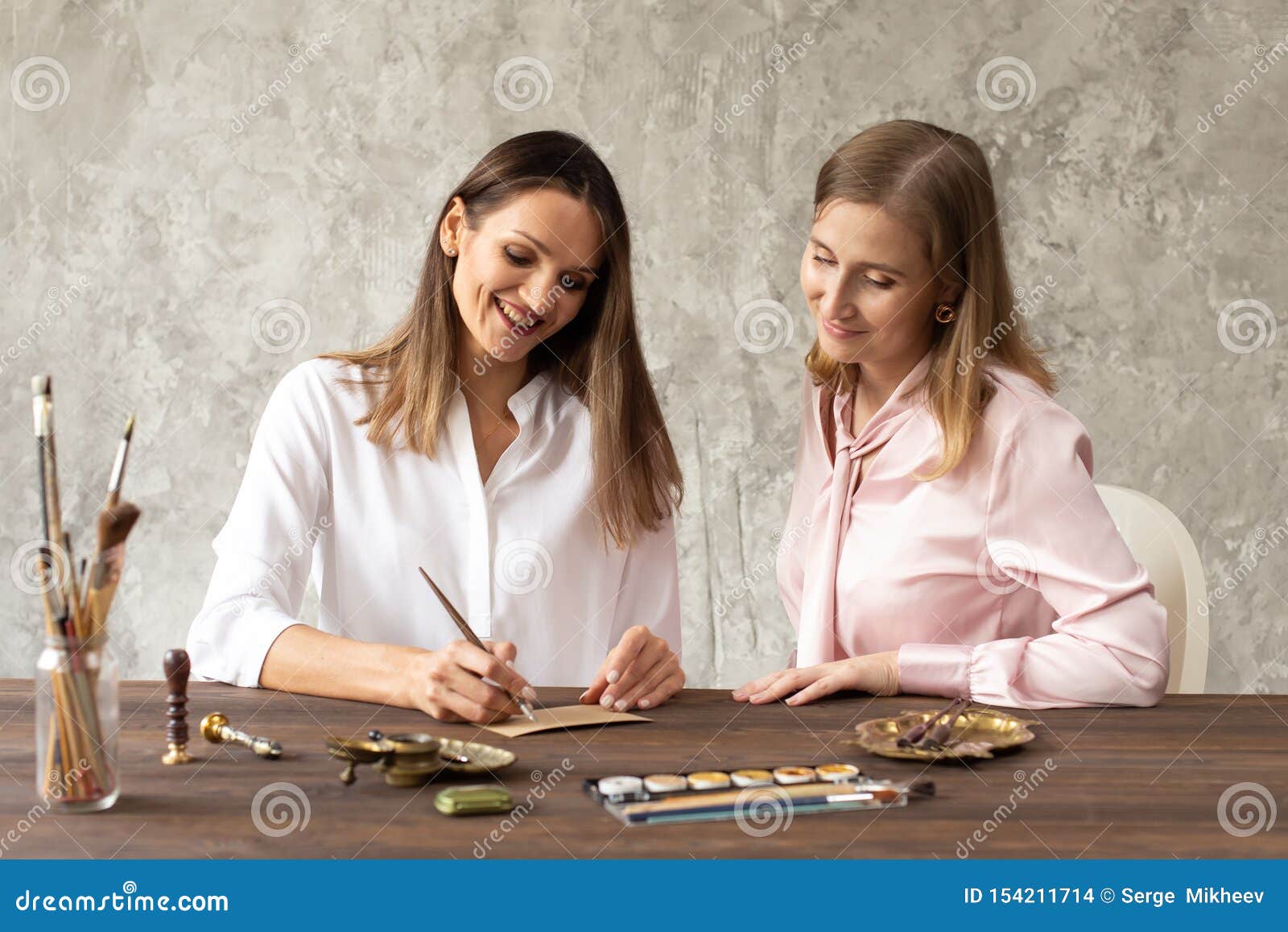 Learning Calligraphy in Art Workshop. Teacher and Students. Art School ...