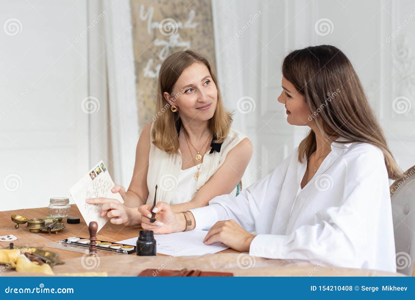 Learning Calligraphy in Art Workshop. Teacher and Students. Art School ...