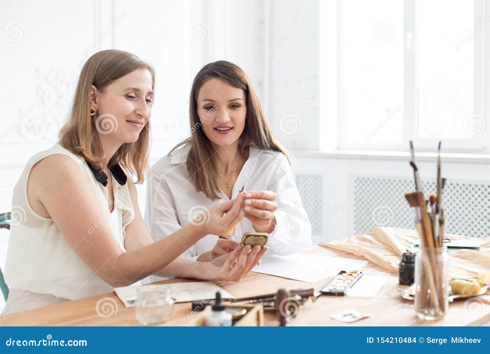 Learning Calligraphy in Art Workshop. Teacher and Students. Art School ...