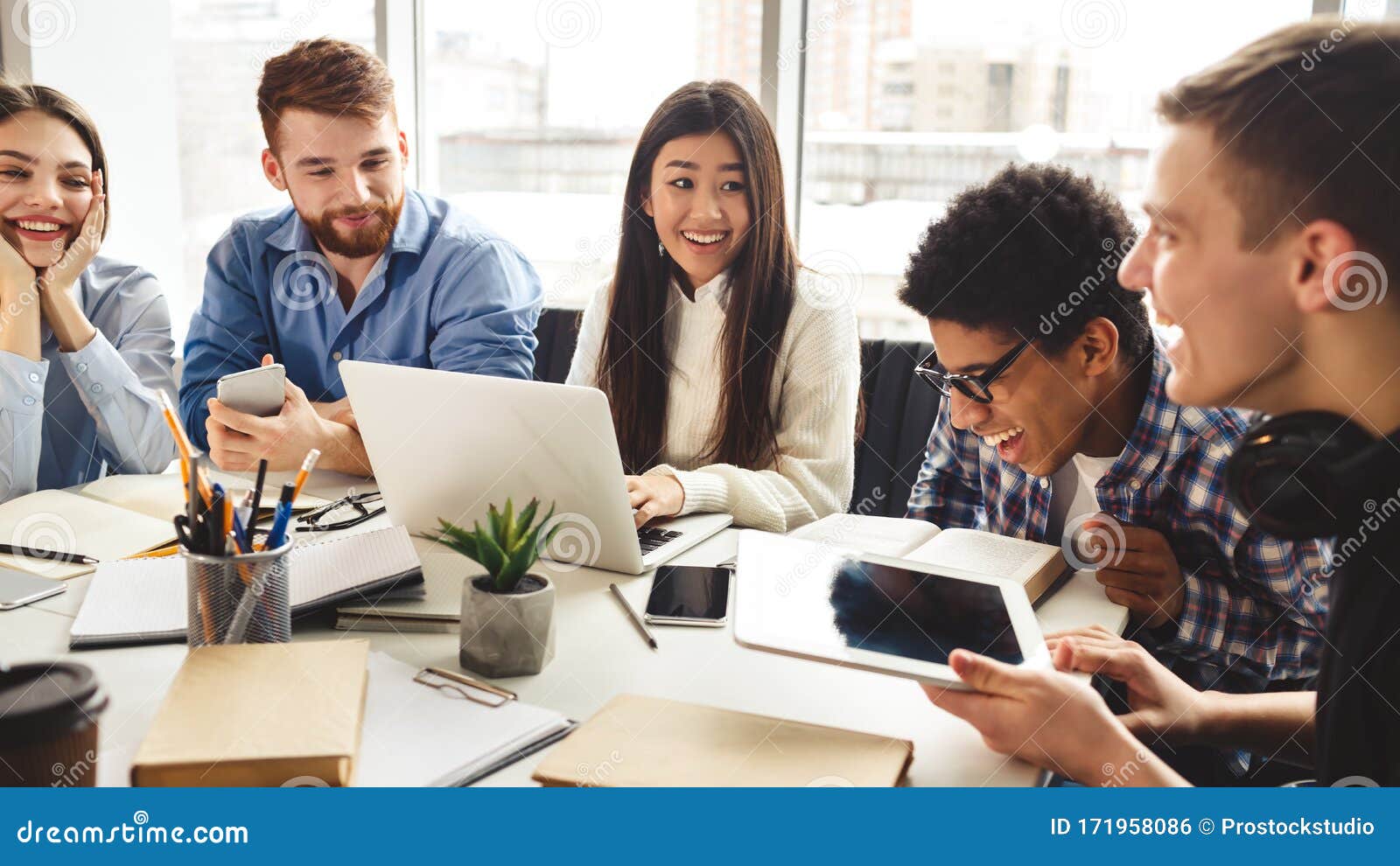 Learning Concept. International Students Doing Group Study in Library ...